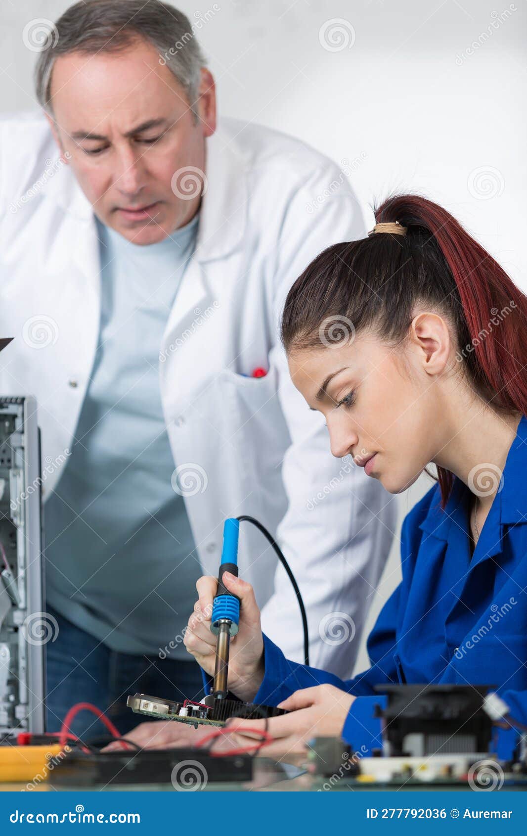 Young Woman Student Repairing Electronics Device Stock Photo - Image of ...