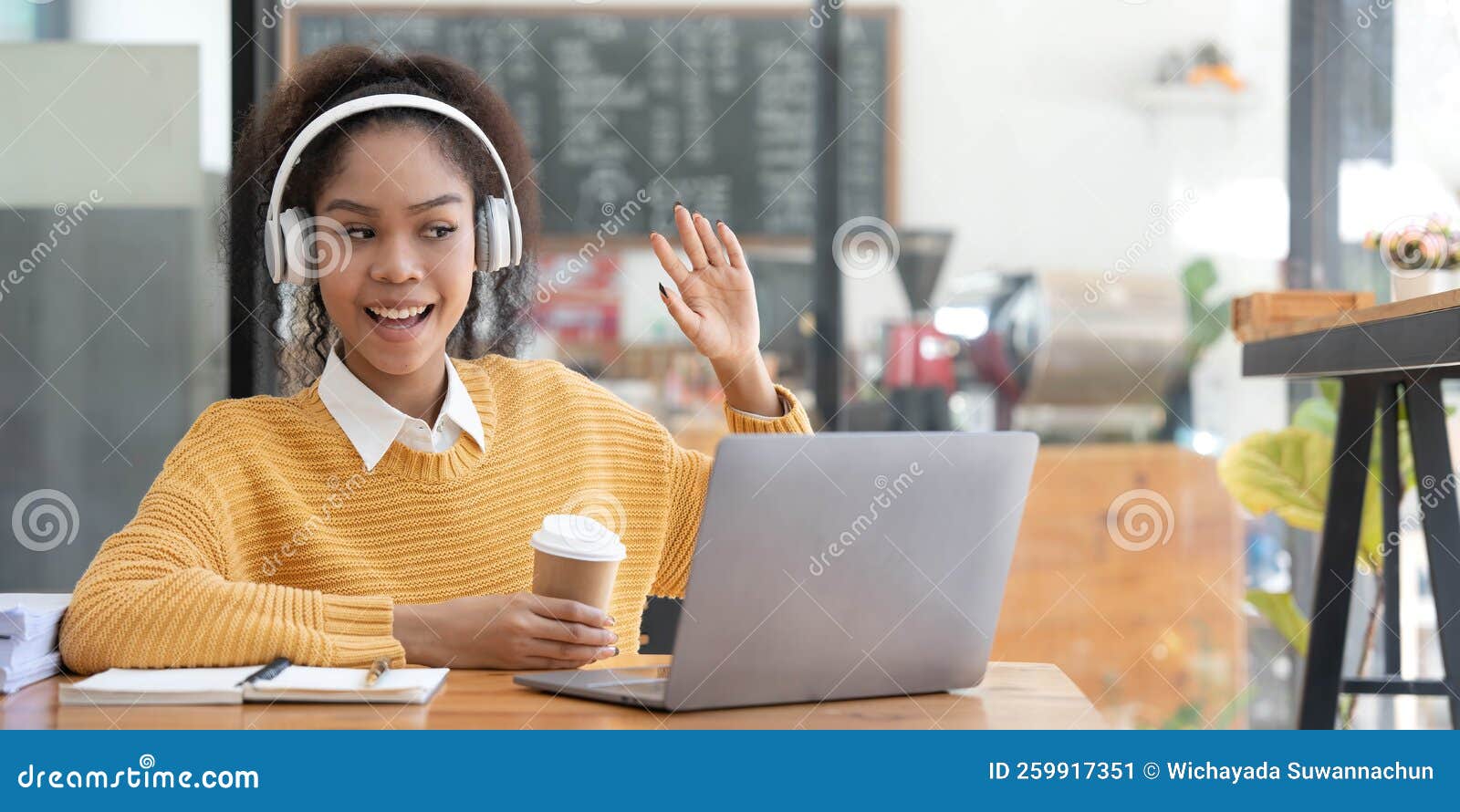 Young Woman Student Using Computer and Mobile Device Studying Online ...