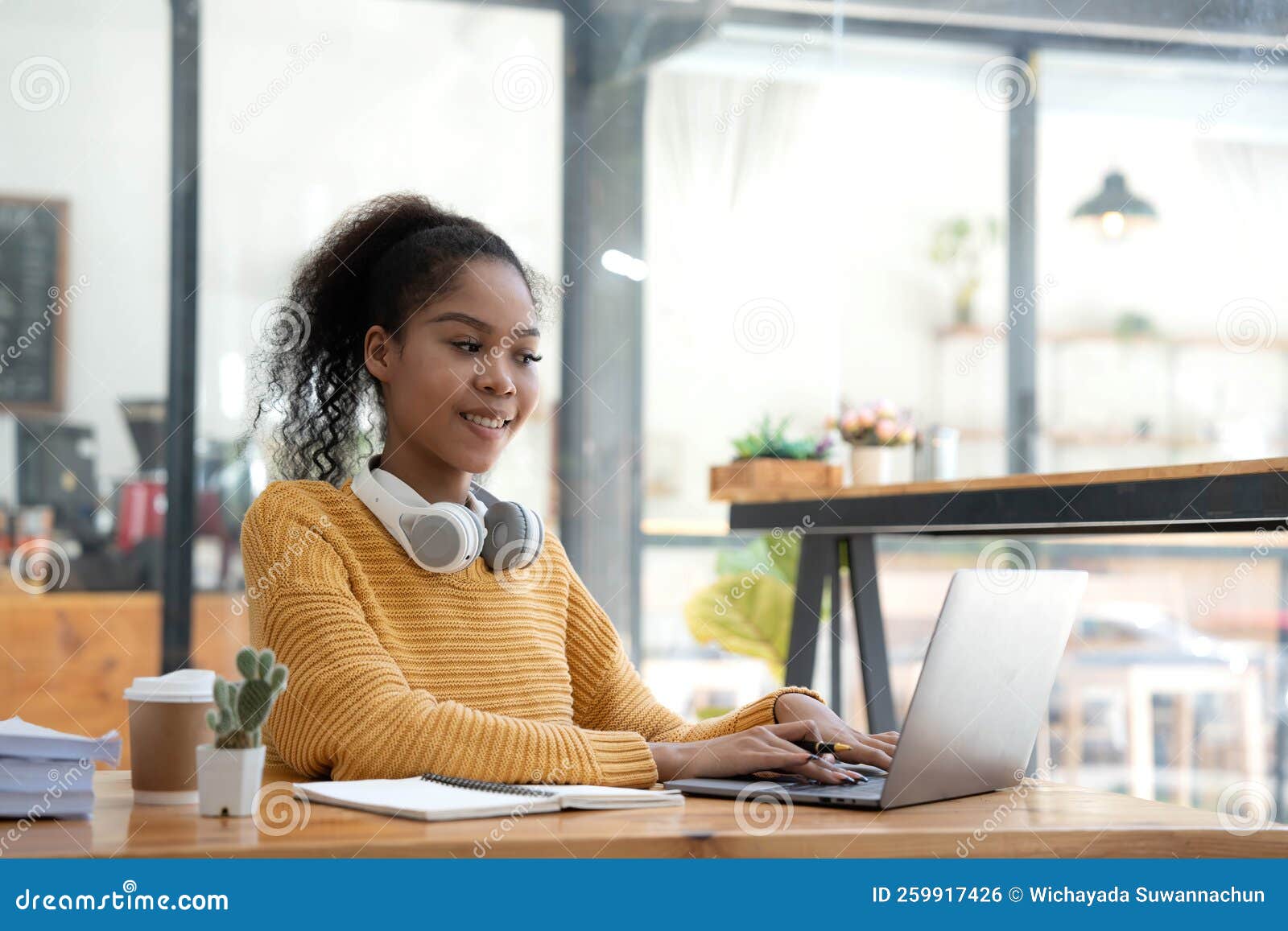 Young Woman Student Using Computer and Mobile Device Studying Online ...