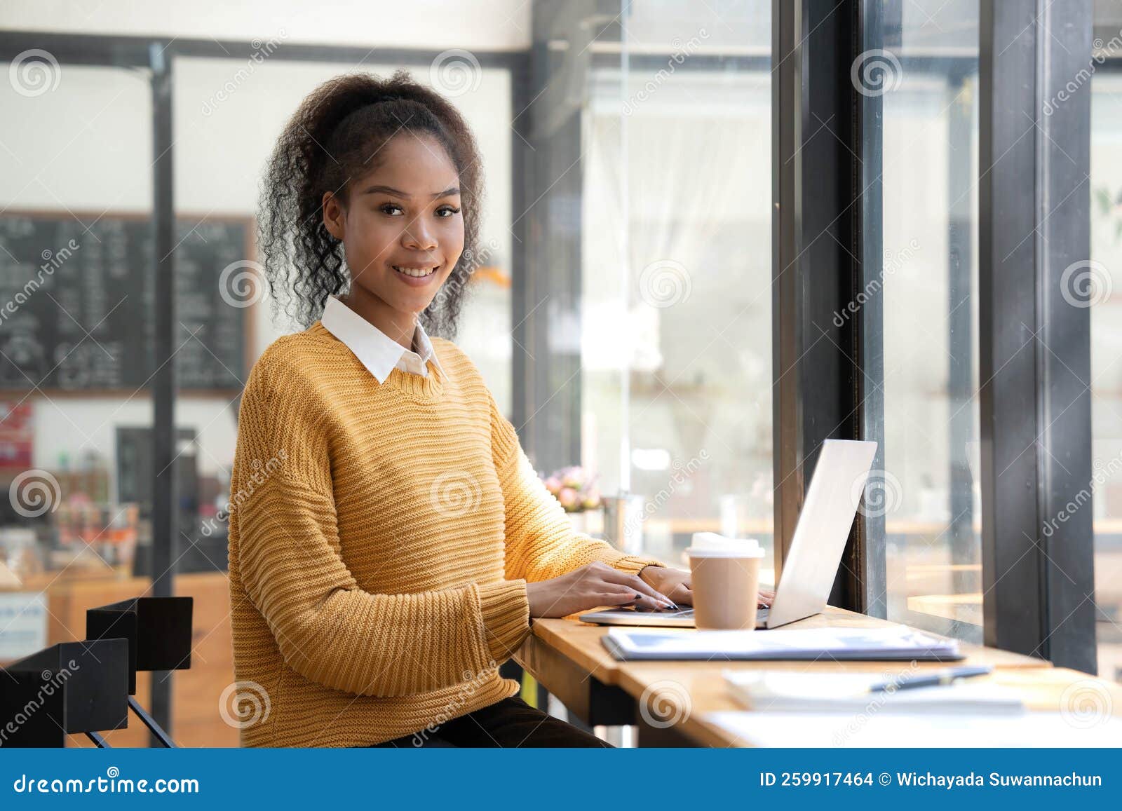 Young Woman Student Using Computer and Mobile Device Studying Online ...