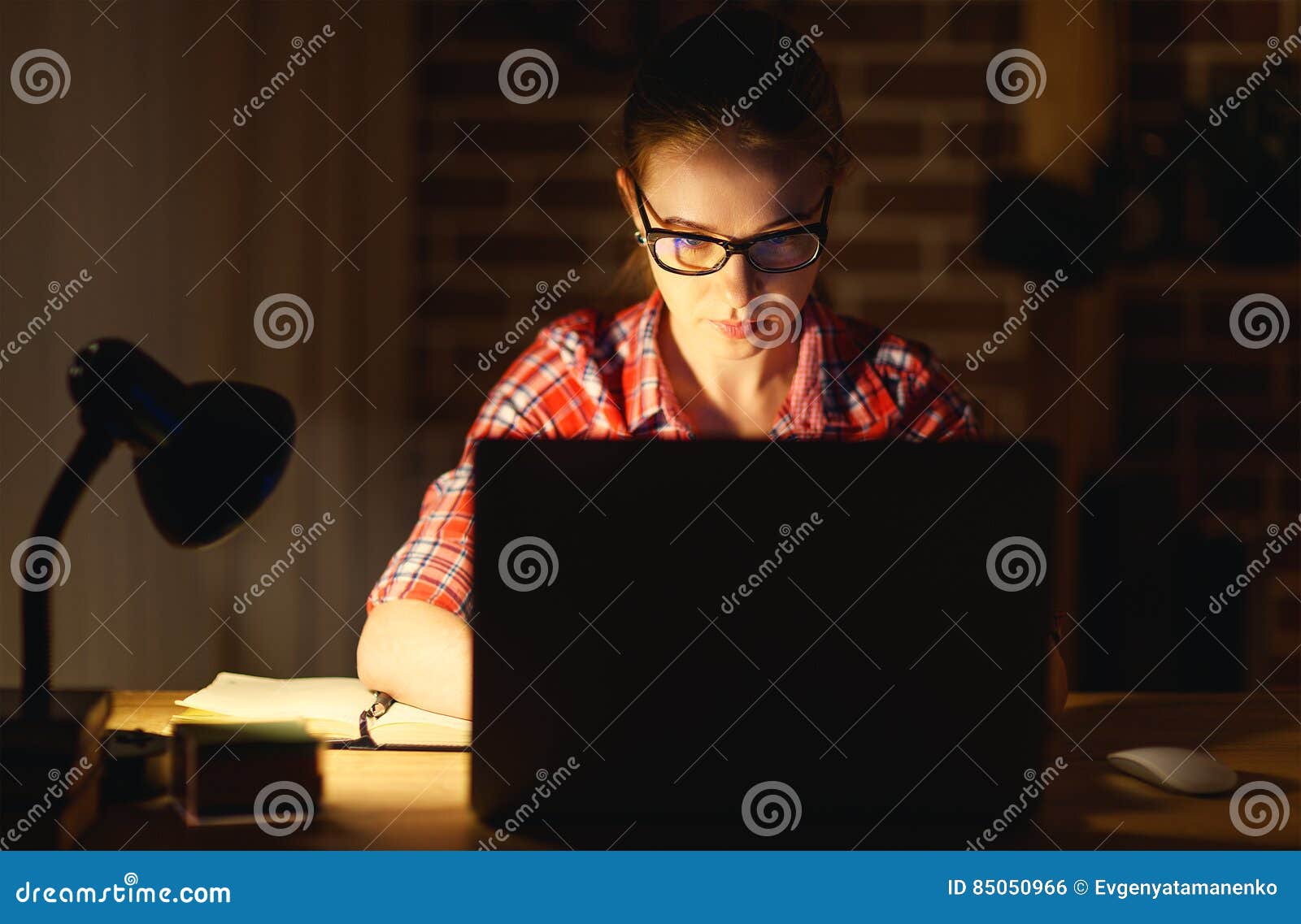 Young Woman Student Working on the Computer at Night Stock Photo ...