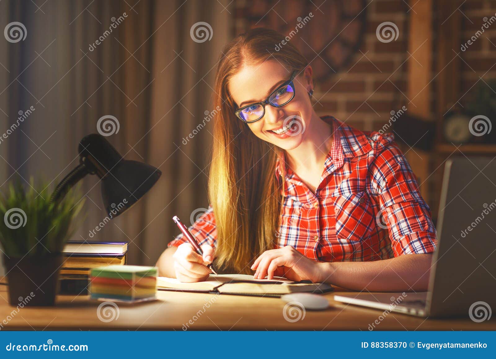 Young Woman Student Working on the Computer at Night Stock Photo ...
