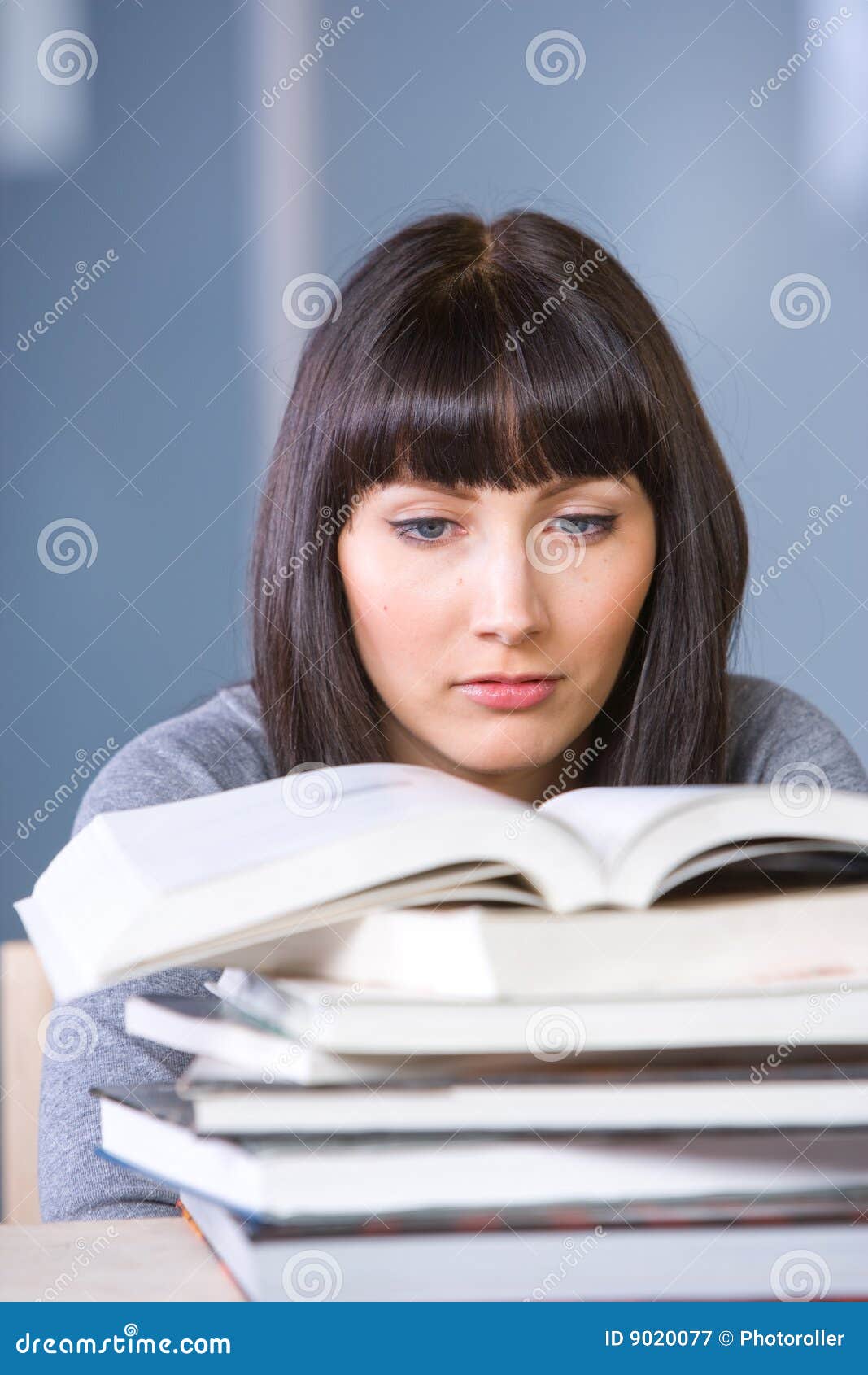 Young woman studying stock image. Image of people, room - 9020077