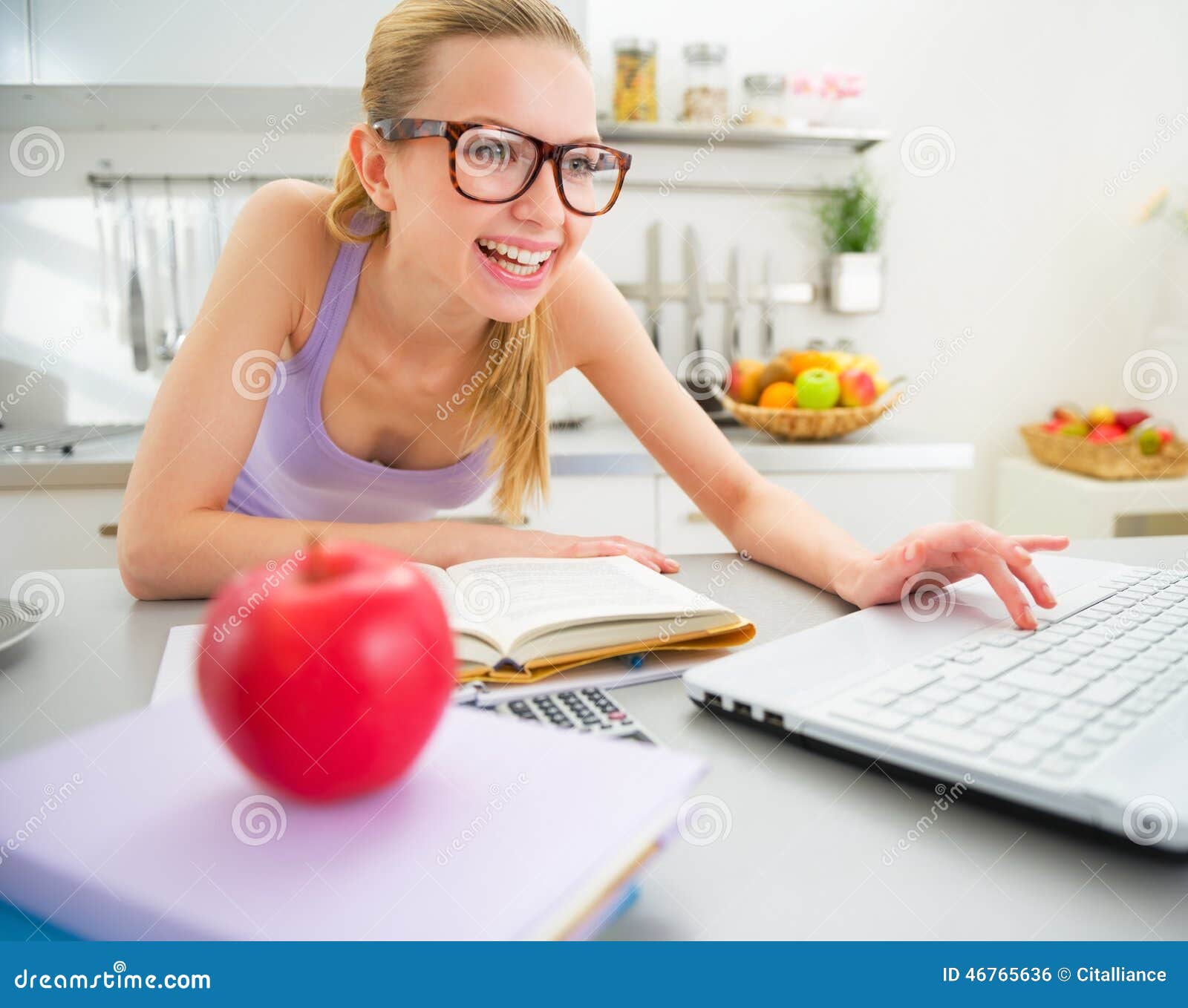 Young Woman Studying in Kitchen Stock Photo - Image of internet ...