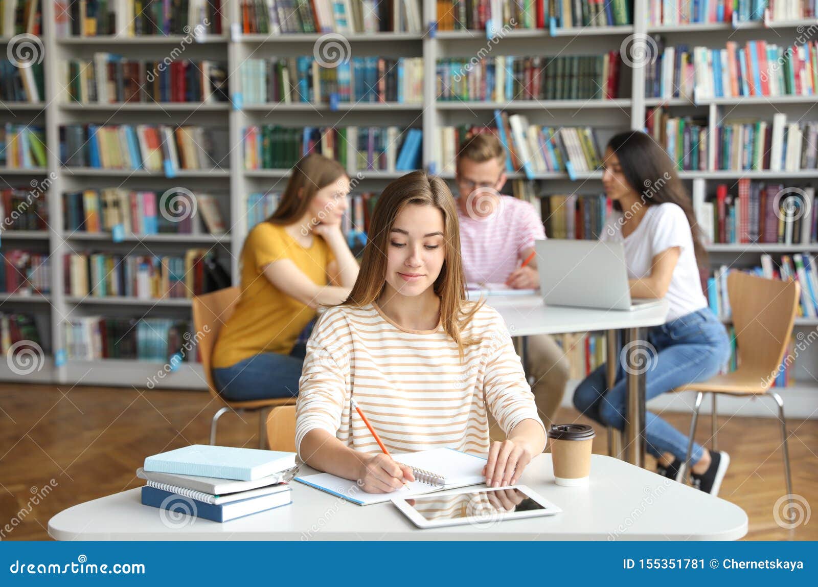 Young Woman Studying at Table Stock Image - Image of clever, caucasian ...