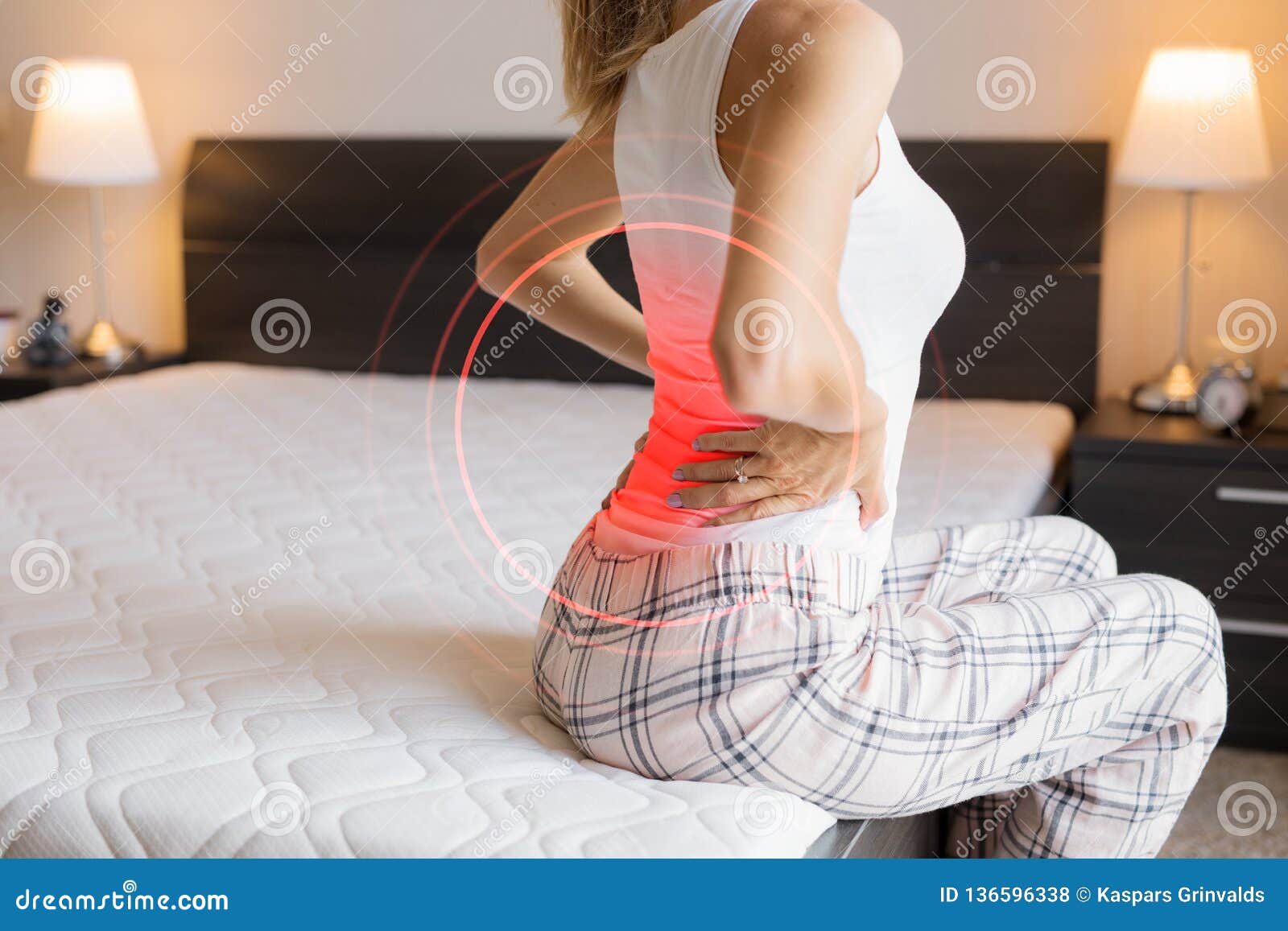 Woman Suffering from Back Pain because of Uncomfortable Mattress Stock ... Woman Suffering from Back Pain because of Uncomfortable Mattress Stock ...