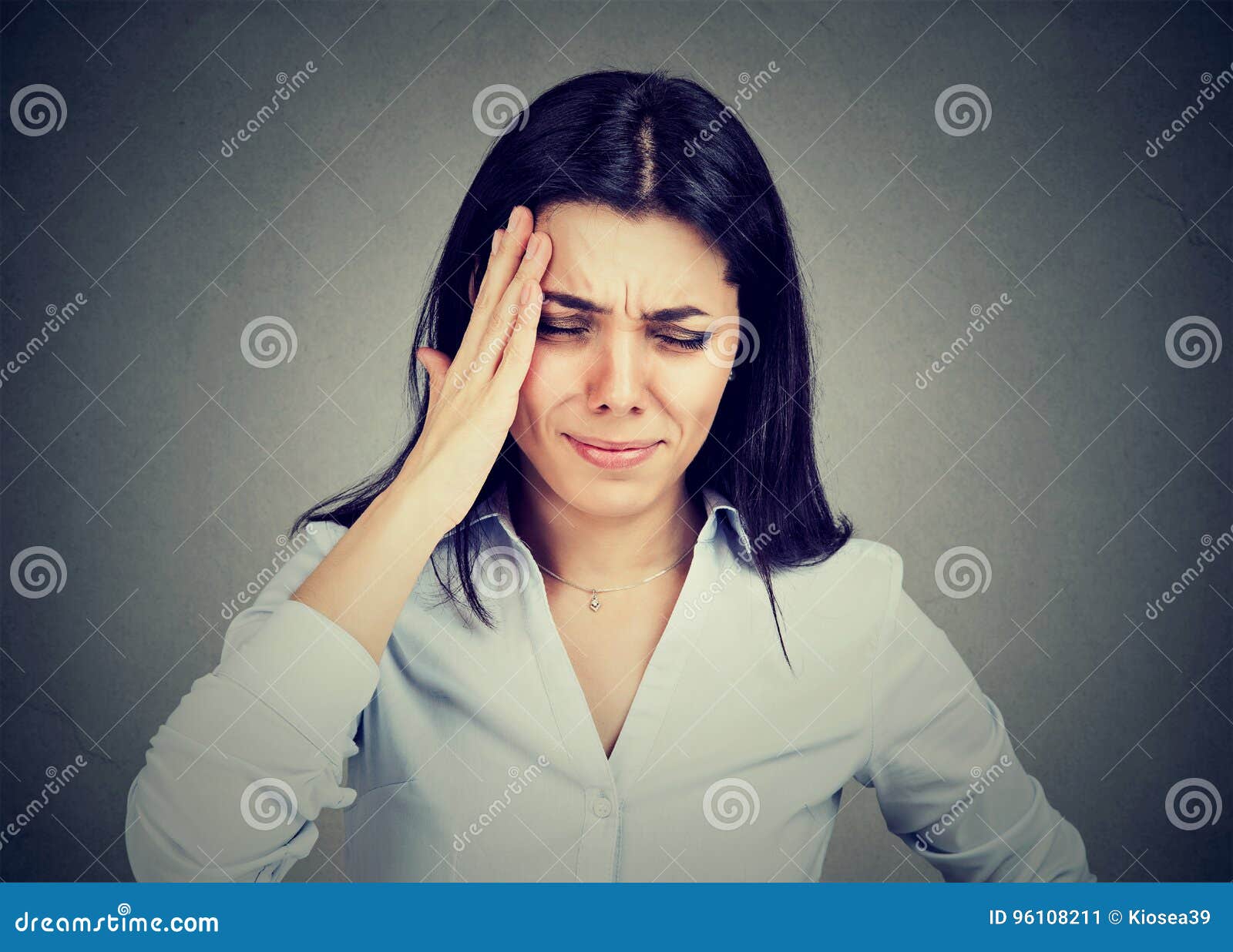 Young Woman Suffering from Headache Touching Her Head with Hand Stock ...