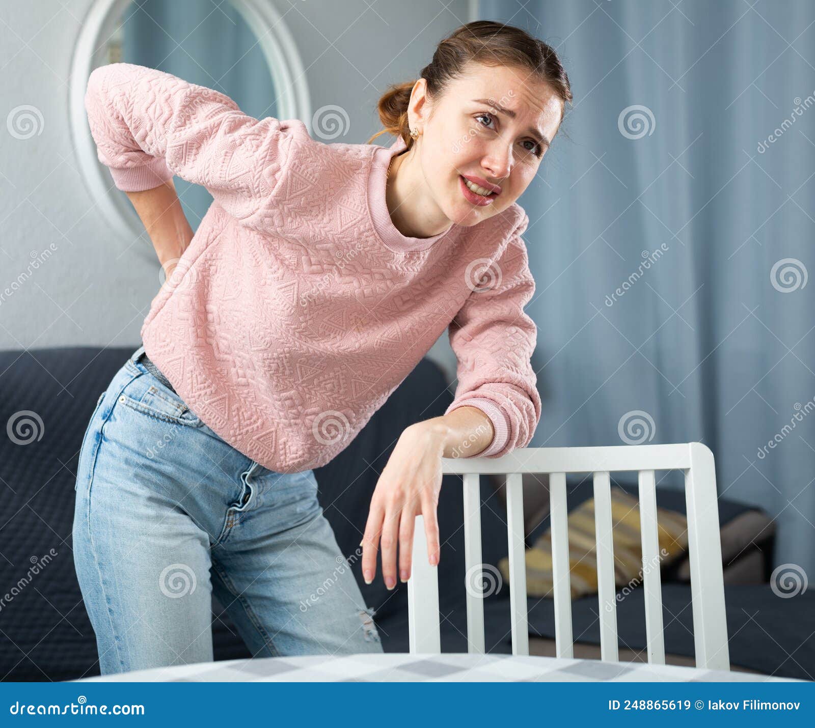 Woman Suffering from Lower Back Pain at Home Stock Image - Image of ...