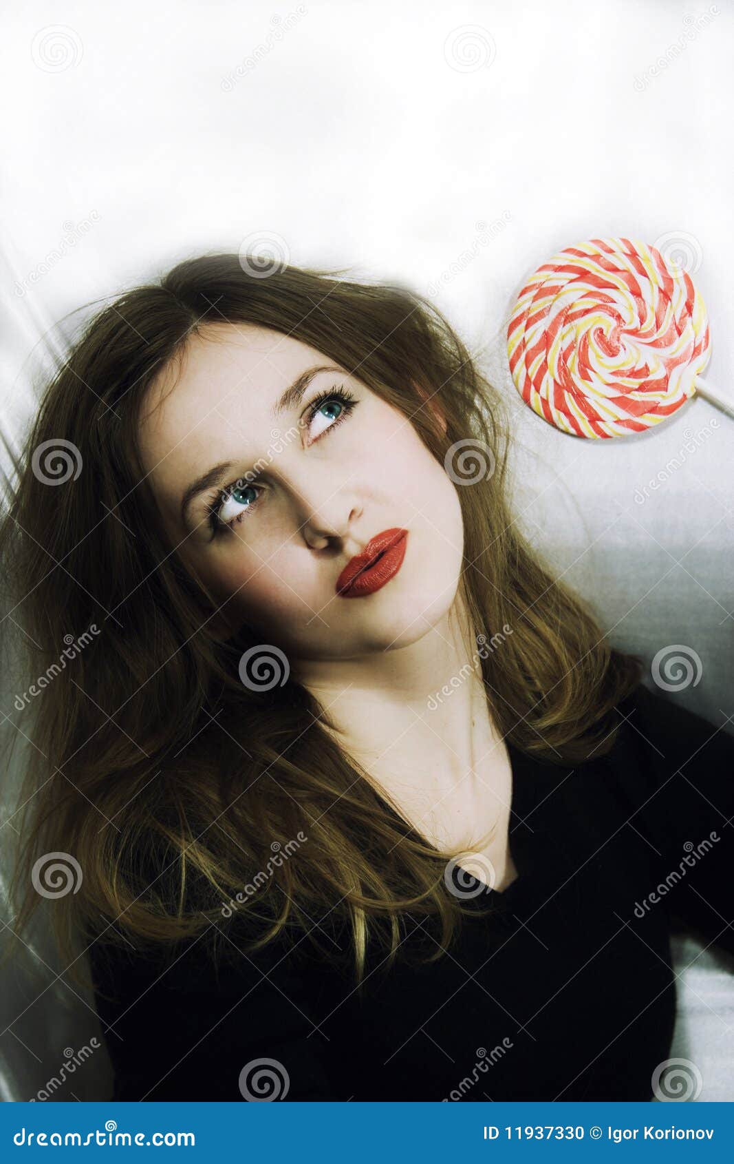 Young Woman with a Sugar Candy Stock Photo - Image of hand, haired ...