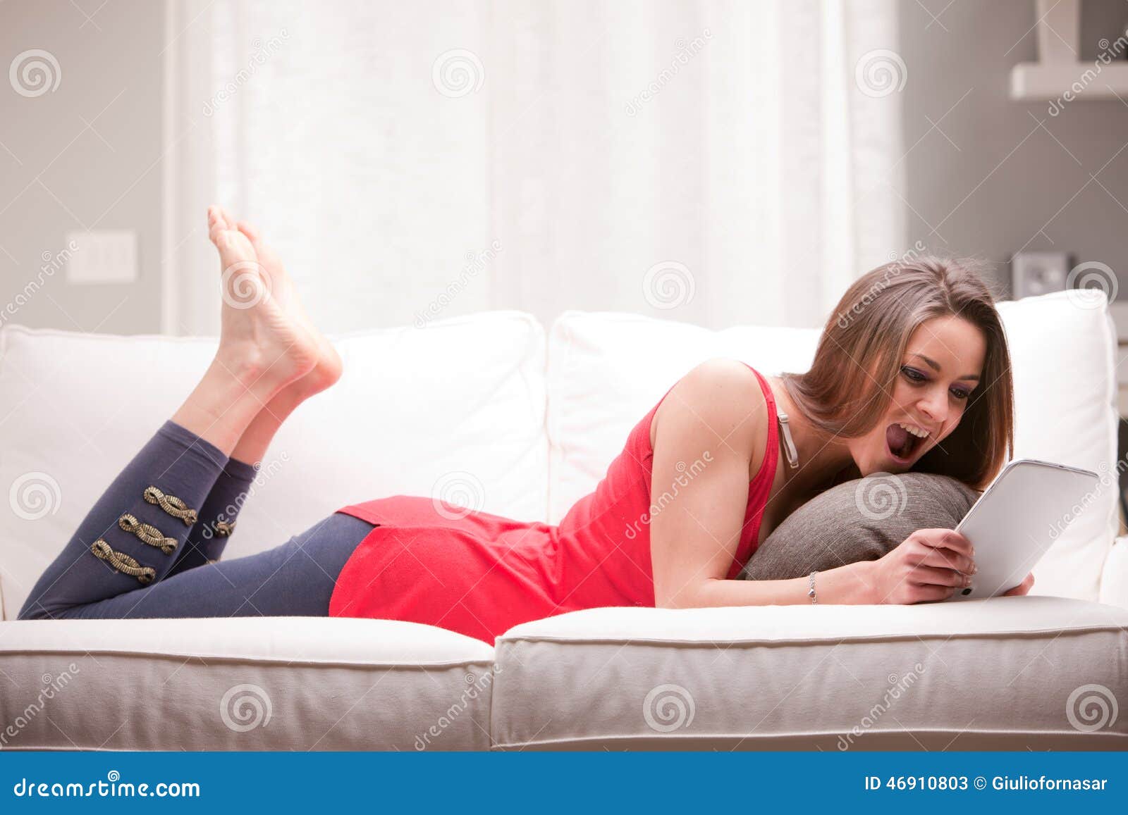 Young Woman Surprised by Her Tablet Stock Image - Image of multimedia ...