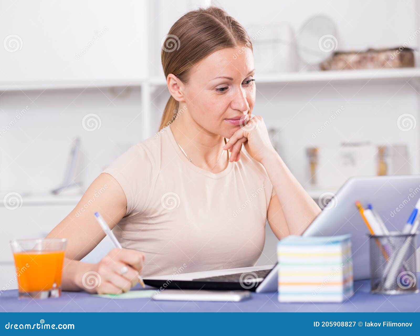 Woman Concentrating on Work on Laptop Stock Image - Image of positive ...