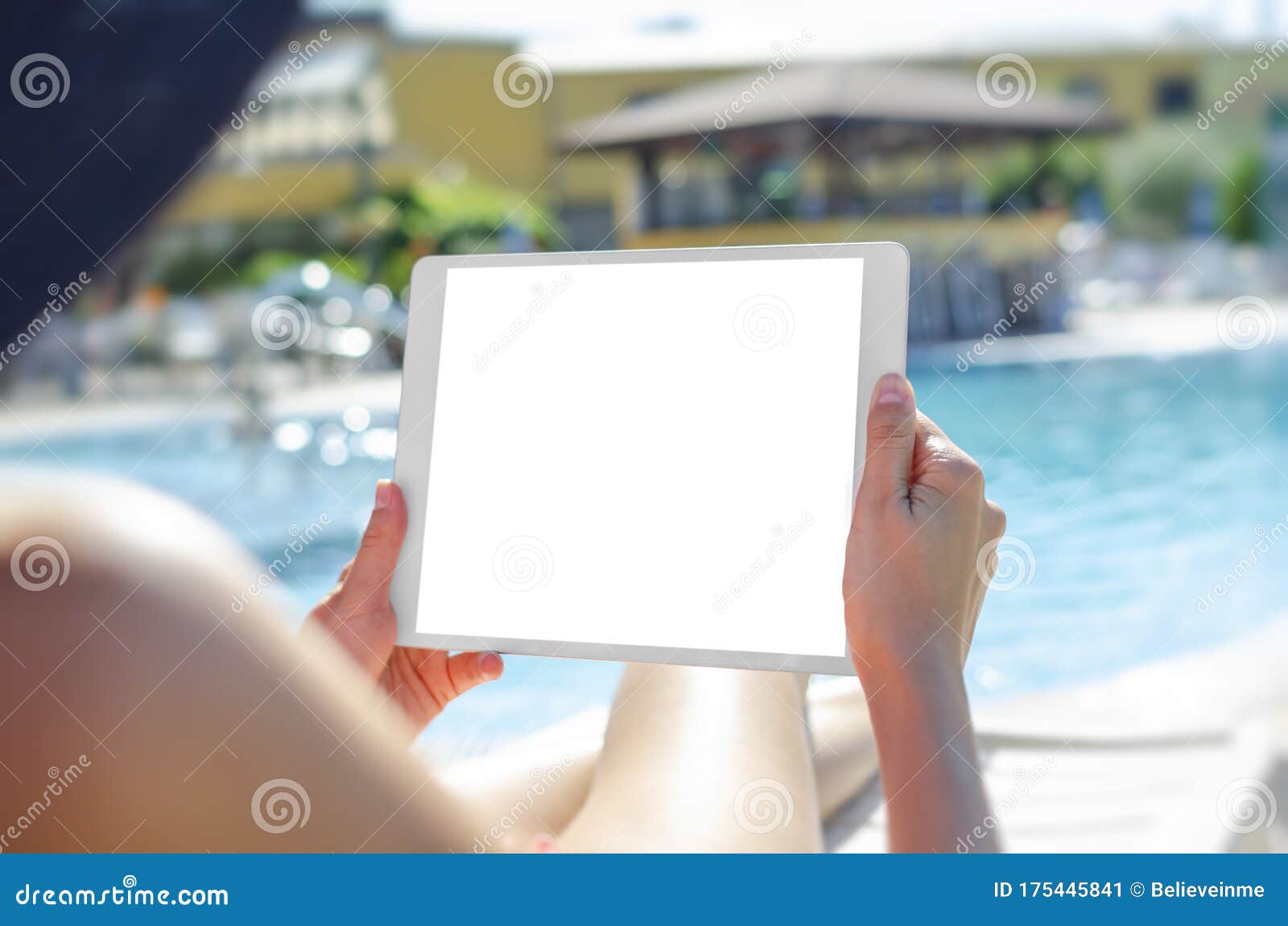 Young Woman with a Tablet by the Pool Stock Image - Image of blue ...