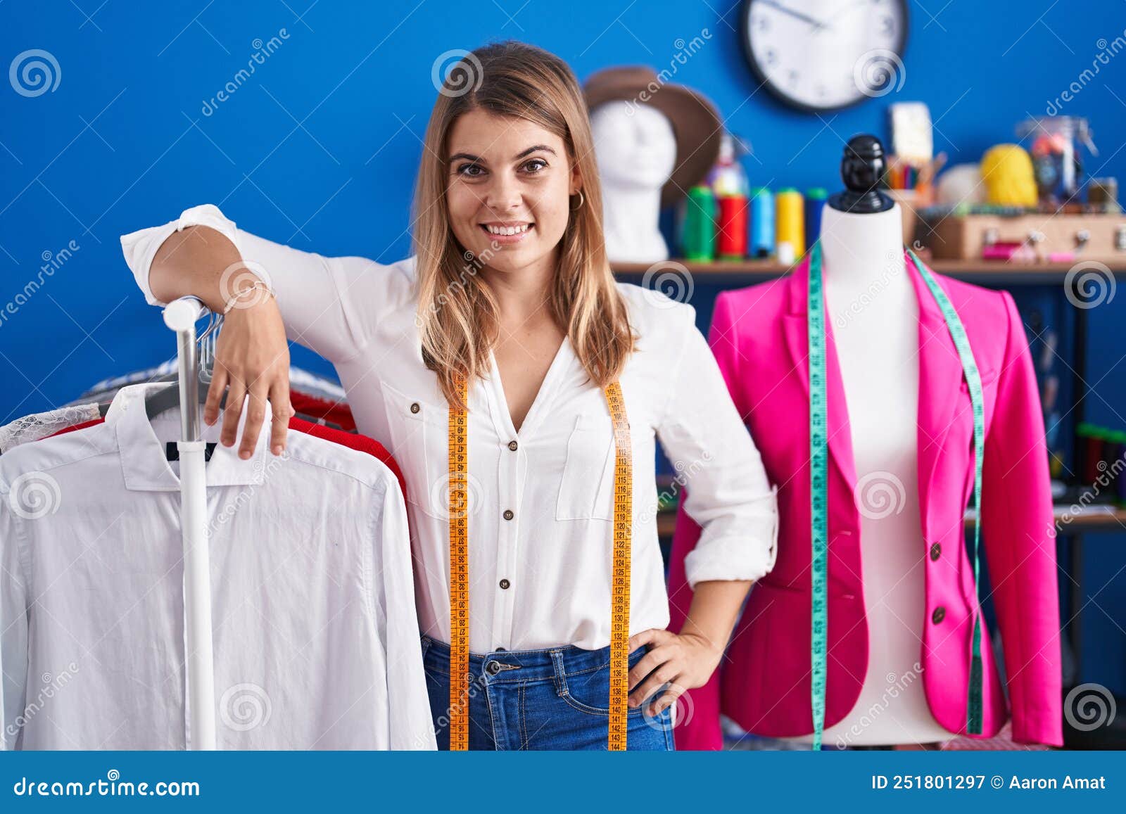 Young Woman Tailor Smiling Confident Leaning on Clothes Rack at Sewing ...