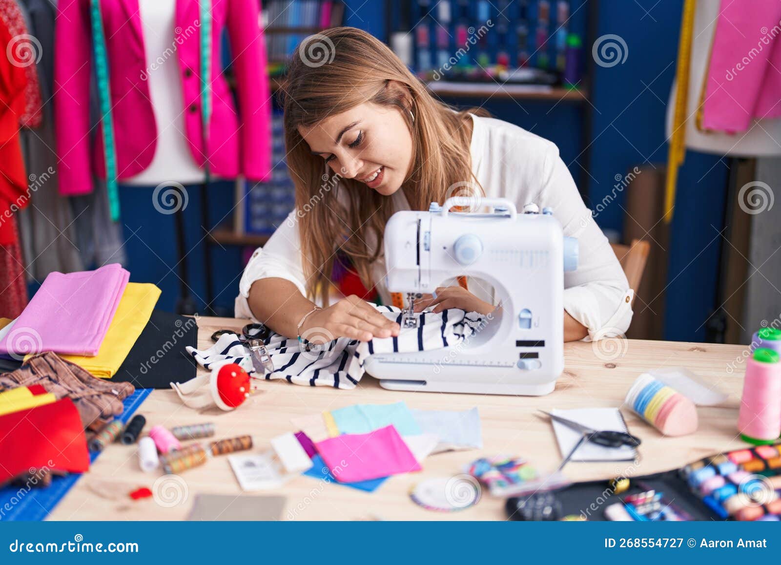 Young Woman Tailor Smiling Confident Using Sewing Machine at Sewing ...
