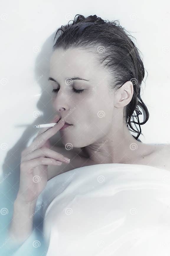 Young Woman Taking a Bath with a Cigarette Stock Photo - Image of ...