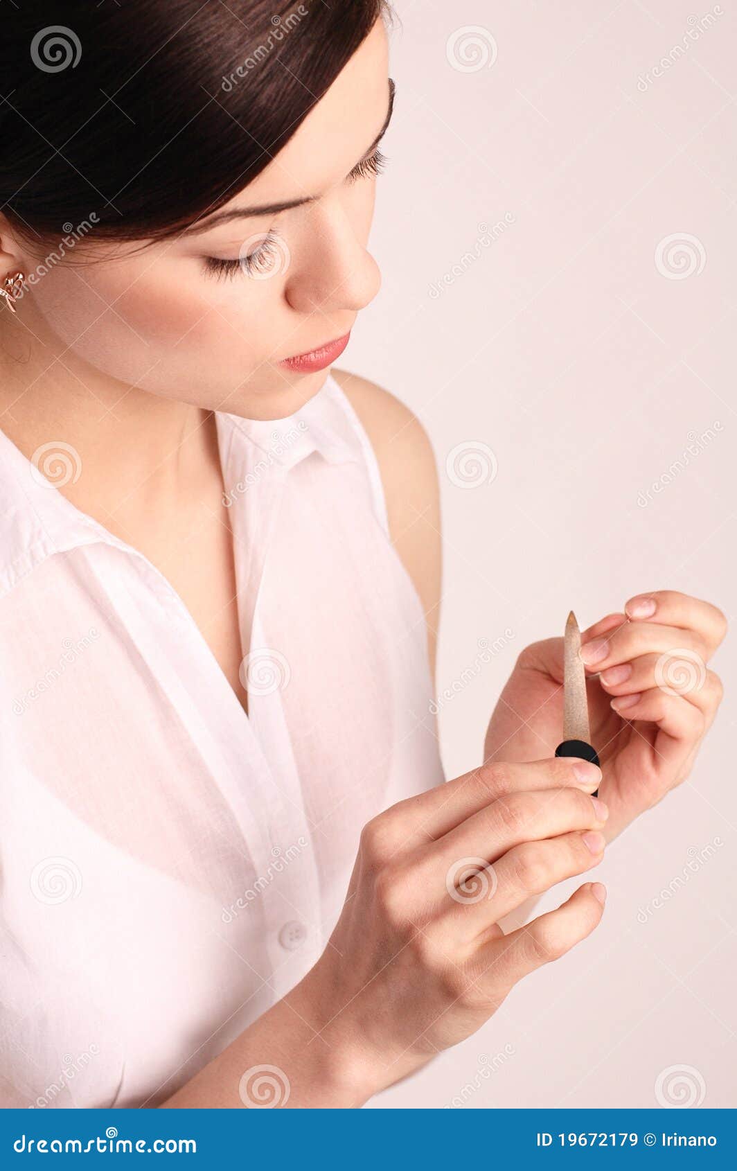 Young Woman Taking Care of Her Nails Stock Image - Image of ethnic ...