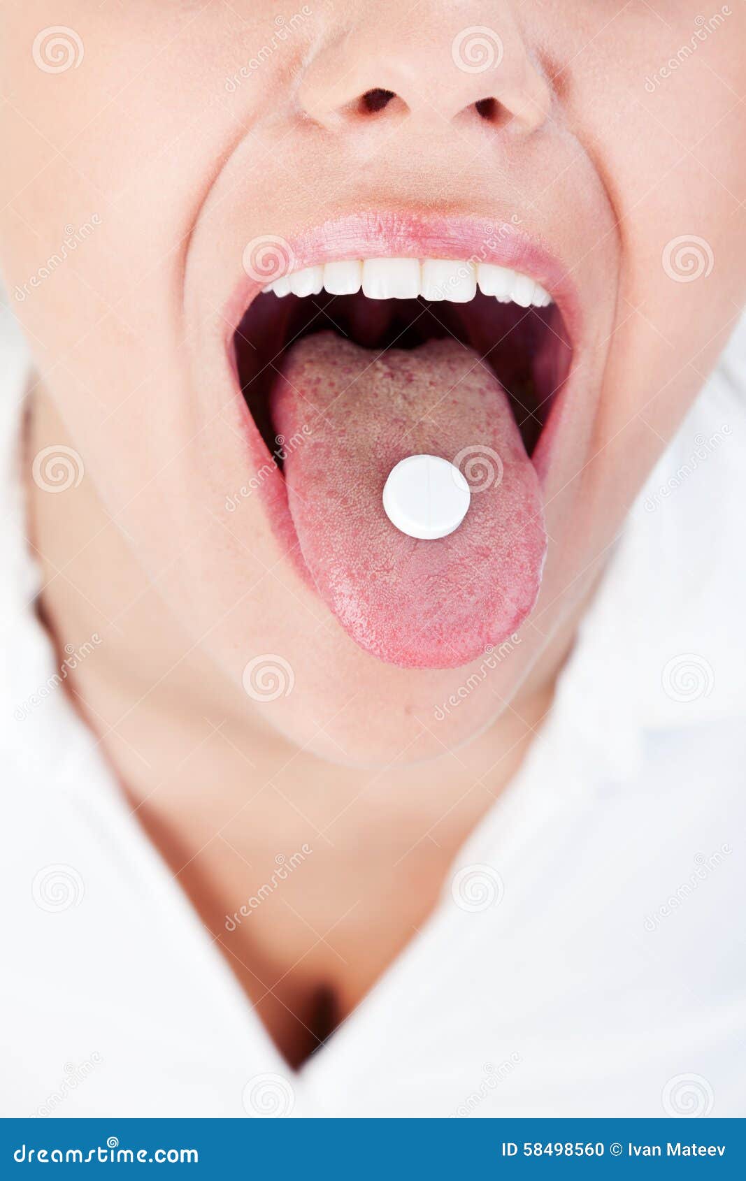 Young woman taking a pill stock photo. Image of medicine - 58498560