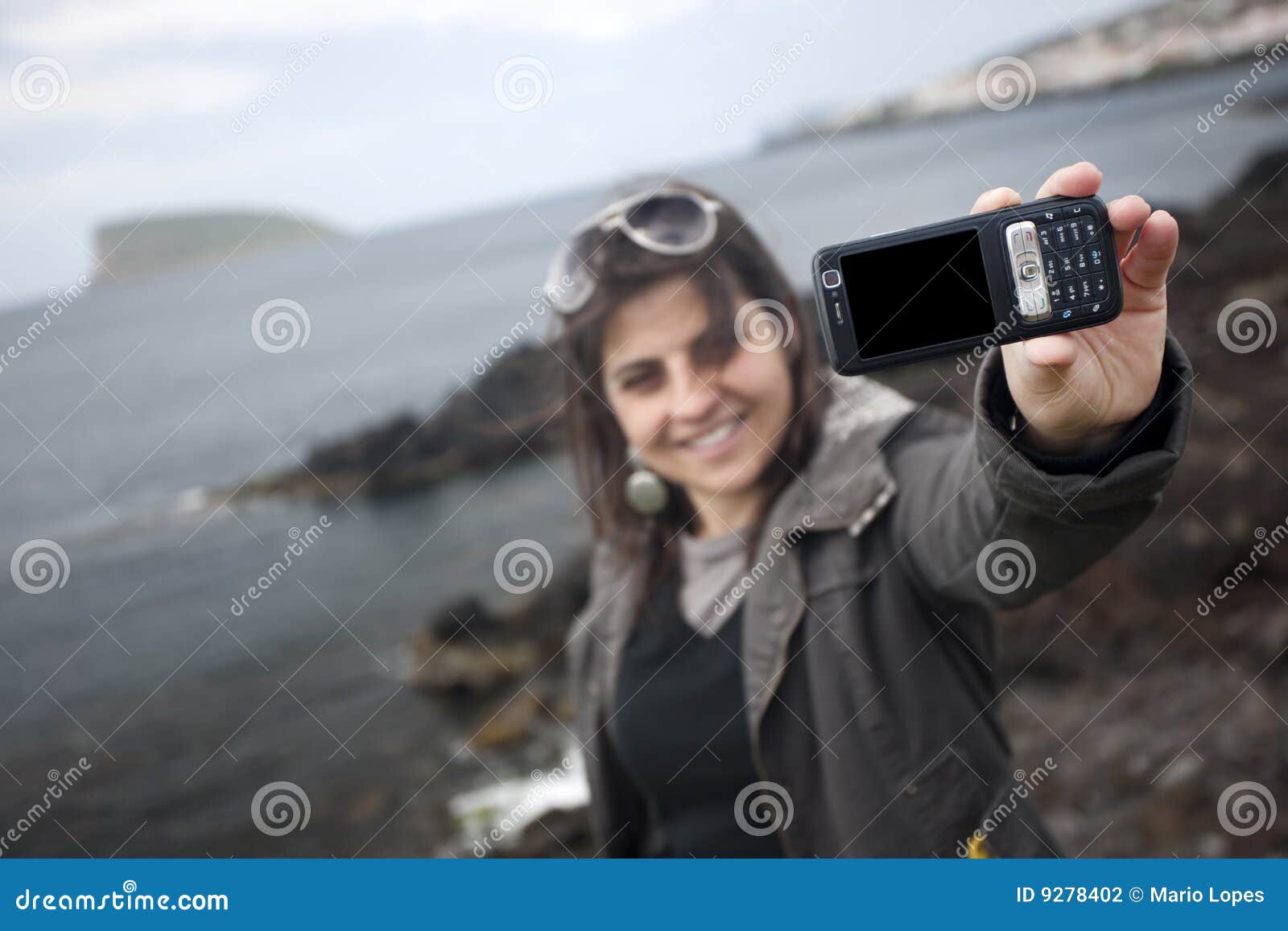 Young Woman Taking Self Portrait with Mobile Phone Stock Photo - Image ...