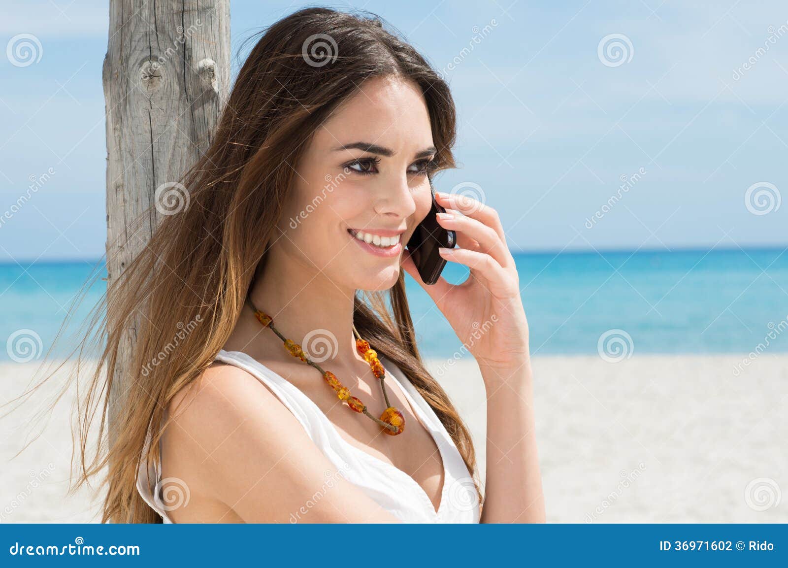 Young Woman Talking on Cellphone Stock Photo - Image of listen ...