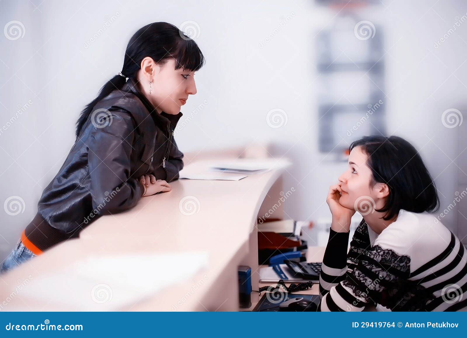 Young Woman Talking with a Client Stock Photo - Image of attractive ...