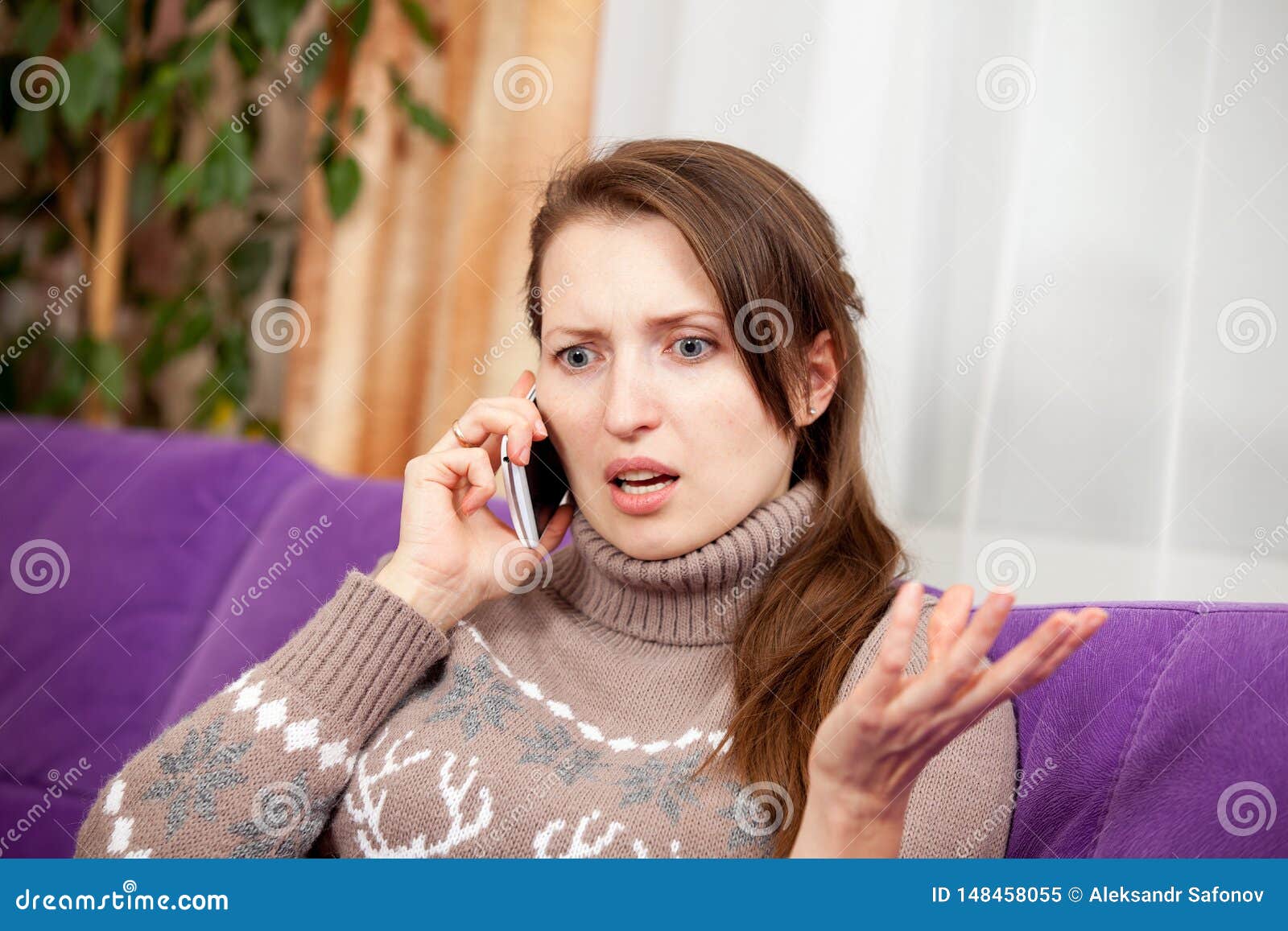 Young Woman Talking on the Phone. Outraged Stock Image - Image of ...
