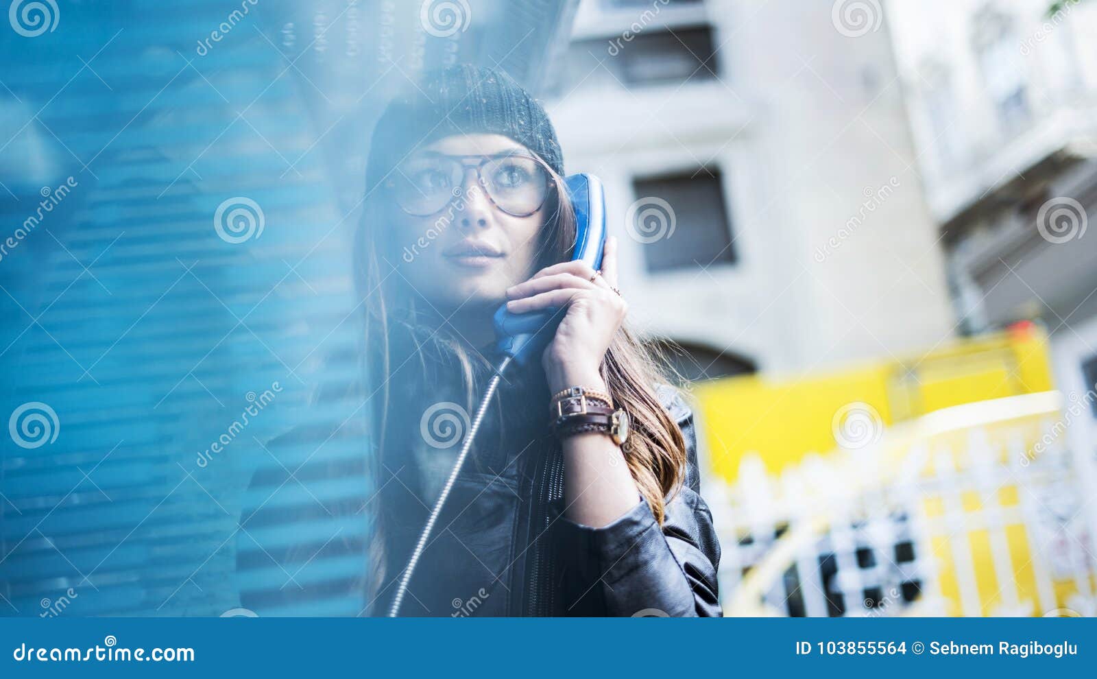 Young Woman Talking on Public Payphone Stock Photo - Image of person ...