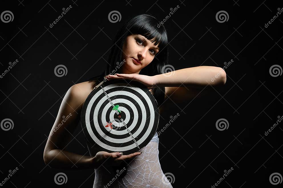 Young Woman with a Target in the Dark Stock Photo - Image of target ...