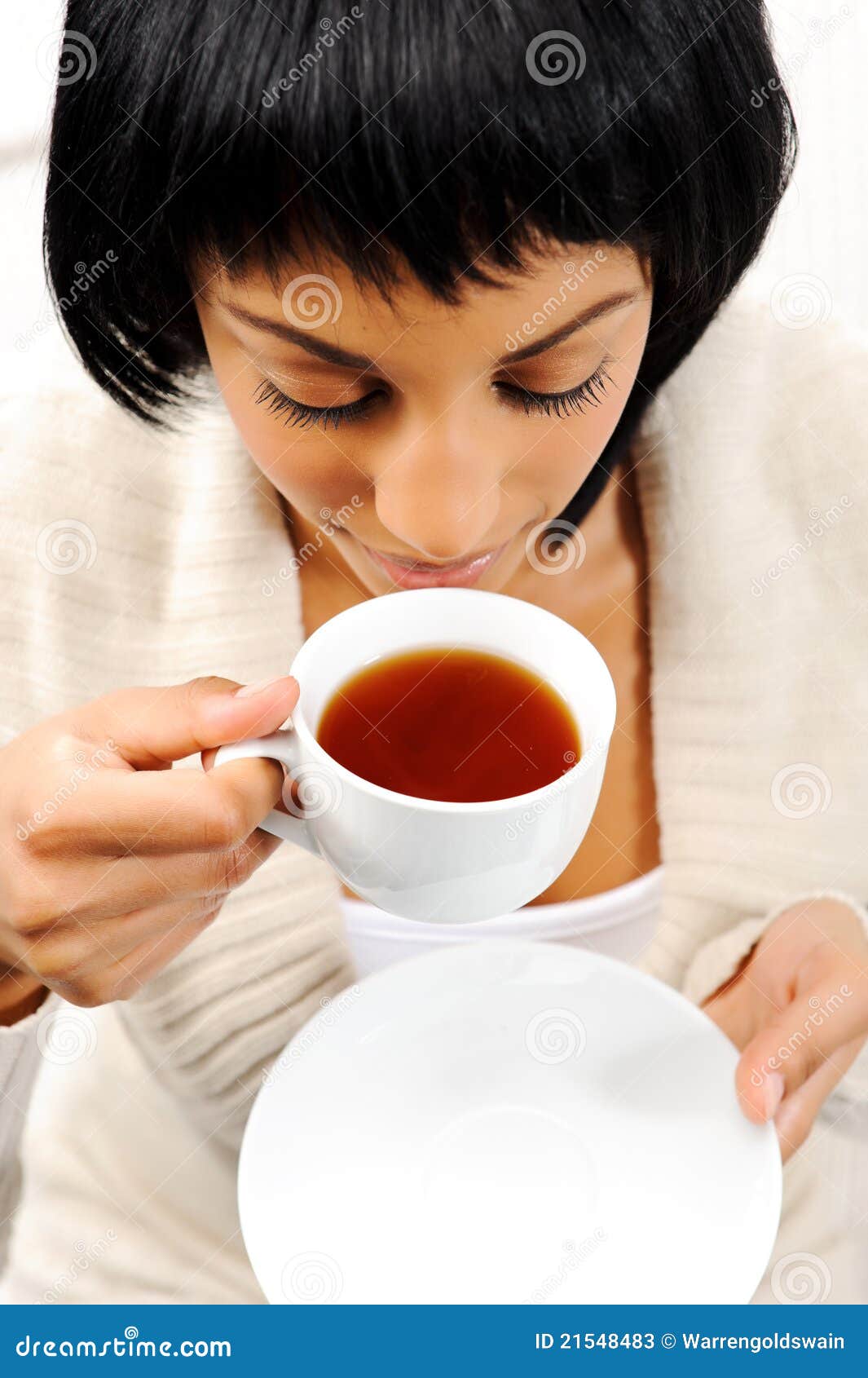 Young woman with tea stock image. Image of contented - 21548483