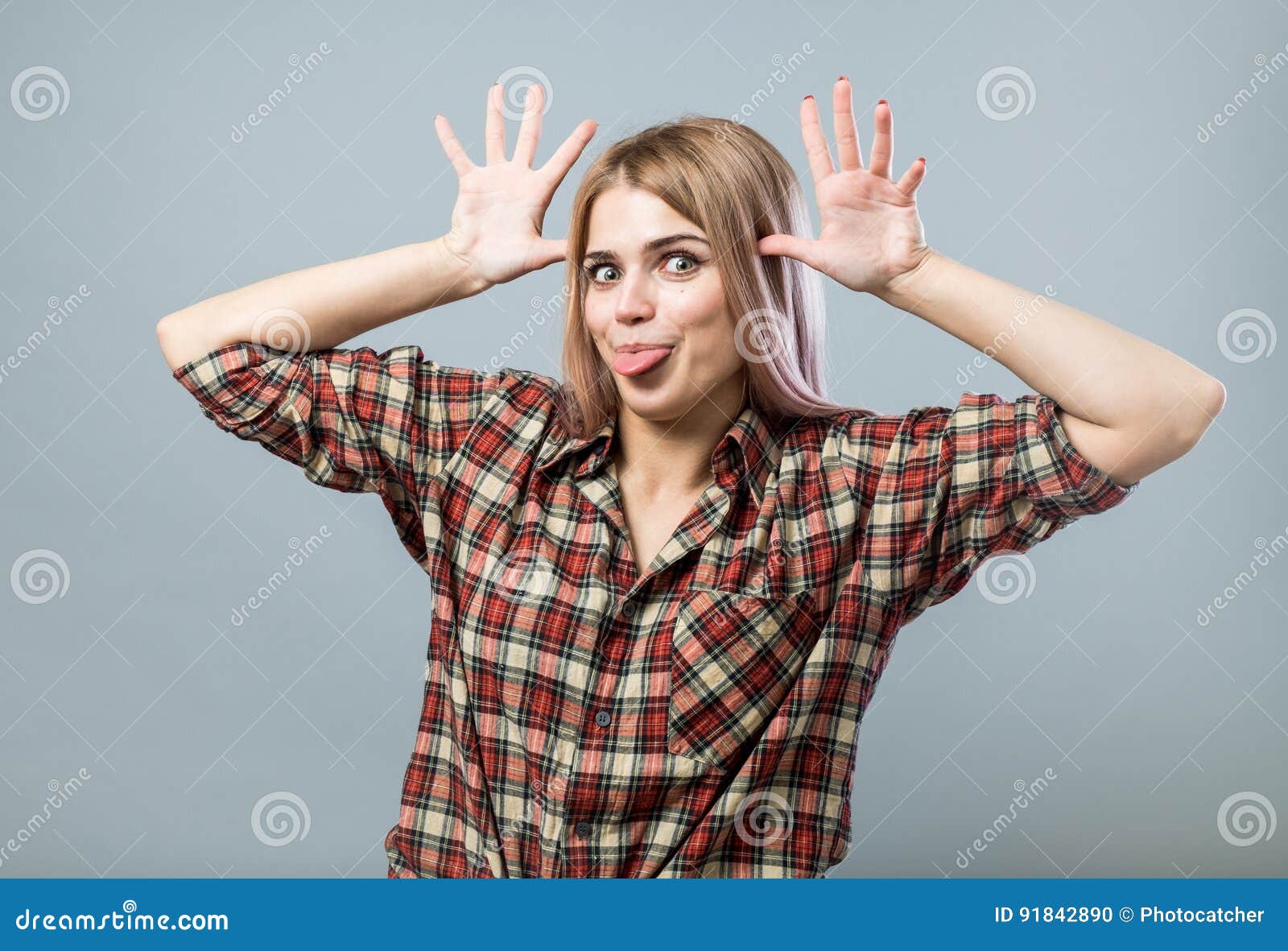 Young woman tease stock photo. Image of studio, playful - 91842890