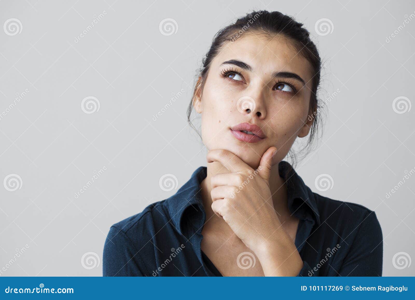 Young Woman Thinking on Gray Background Stock Image - Image of facial ...