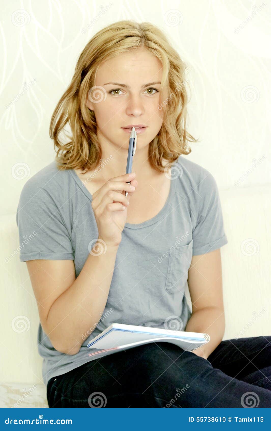Young Woman Thinking Over Making Notes in Notebook Stock Photo - Image ...
