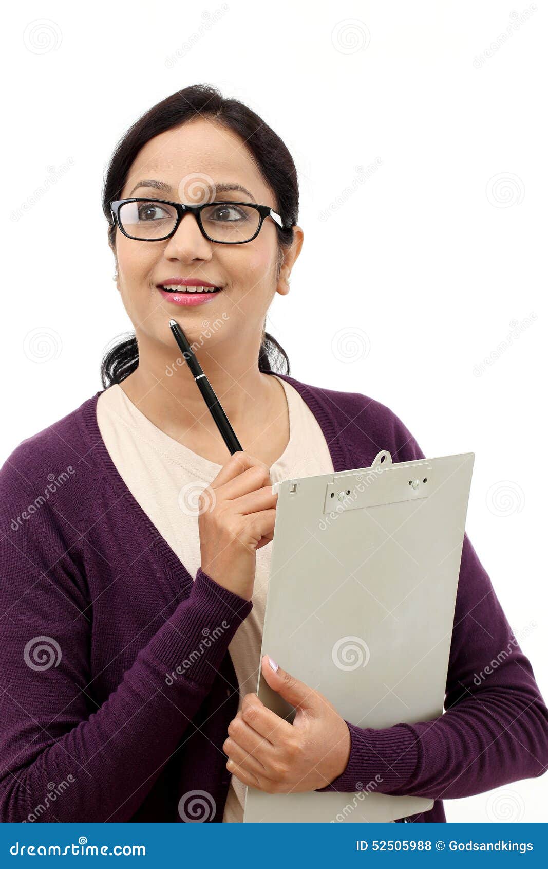 Young Woman Thinking while Taking Notes Stock Photo - Image of people ...