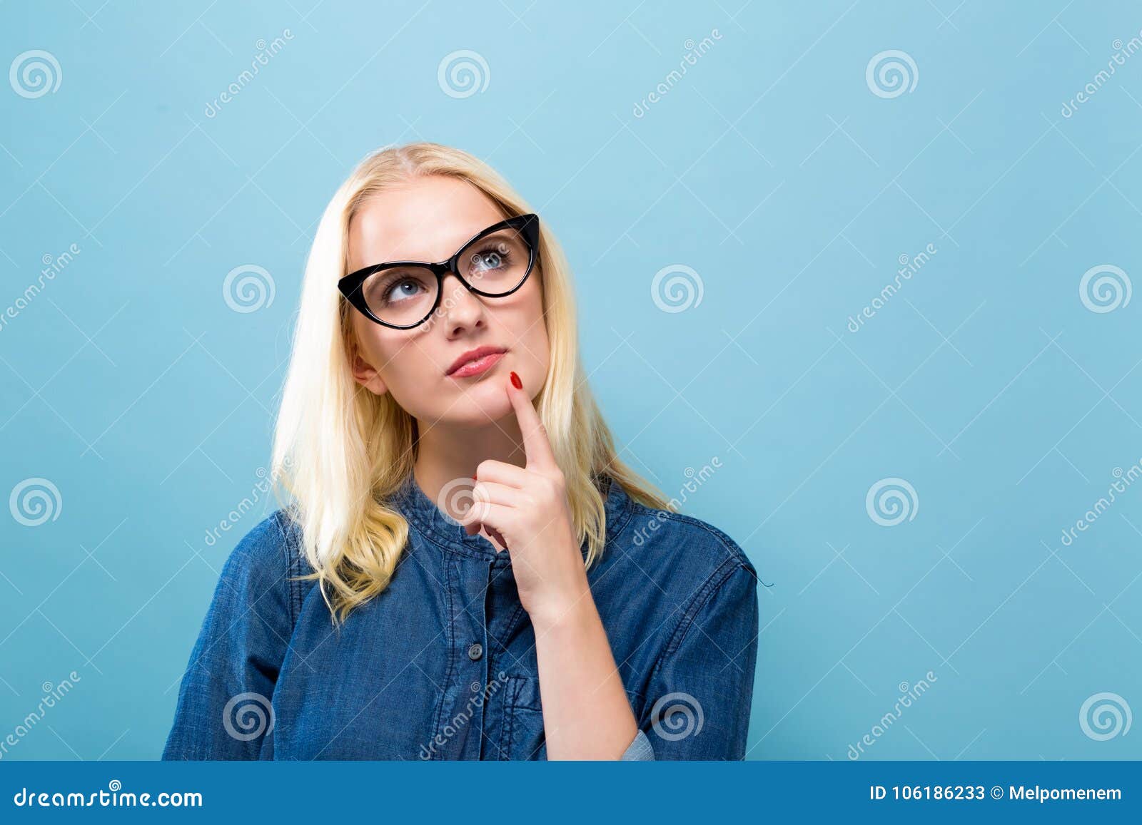 Young Woman in a Thoughtful Pose Stock Image - Image of face, solid ...