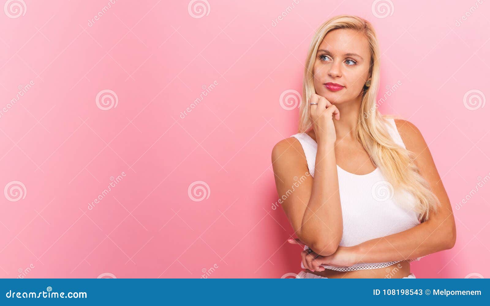 Young Woman in a Thoughtful Pose Stock Image - Image of beautiful ...