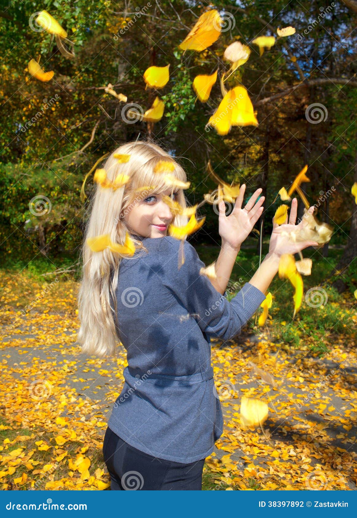 Young Woman Throwing Leaves in the Air Stock Photo - Image of beauty ...