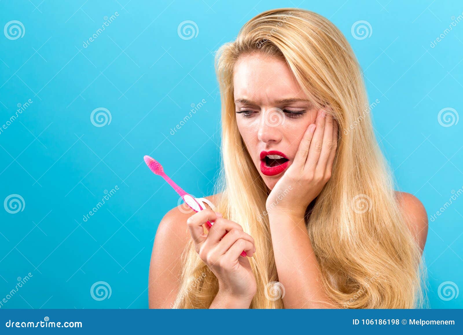Young woman with toothache stock photo. Image of dental - 106186198