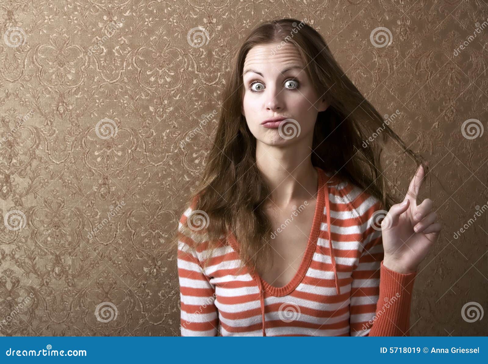 Young Woman Twirling Her Hair Stock Image - Image of young, pretty: 5718019