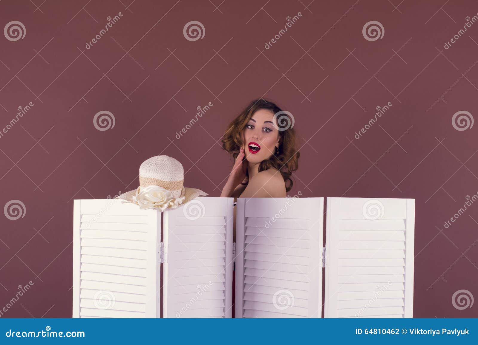 Young Woman Undressing Behind a Screen Stock Photo - Image of create ...