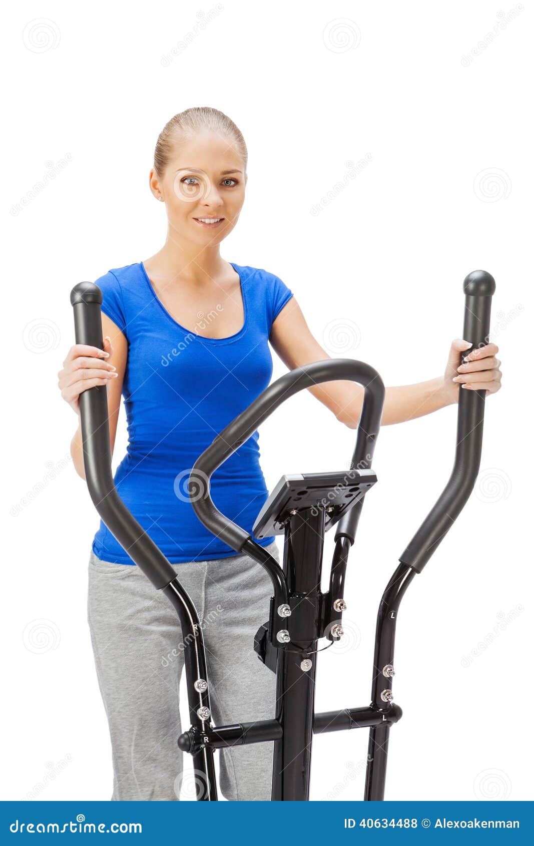 Young Woman Uses Elliptical Cross Trainer. Stock Photo - Image of cross ...