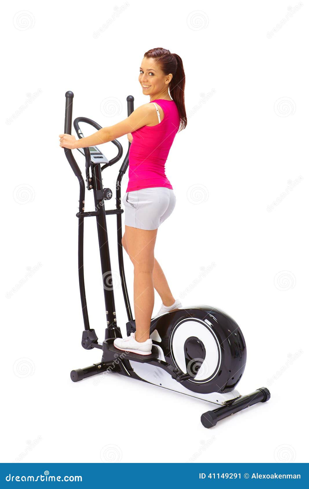 Young Woman Uses Elliptical Cross Trainer. Stock Image - Image of cross ...