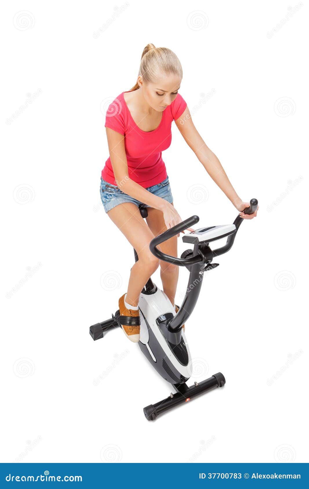 Young Woman Uses Stationary Bicycle Trainer. Stock Image - Image of ...