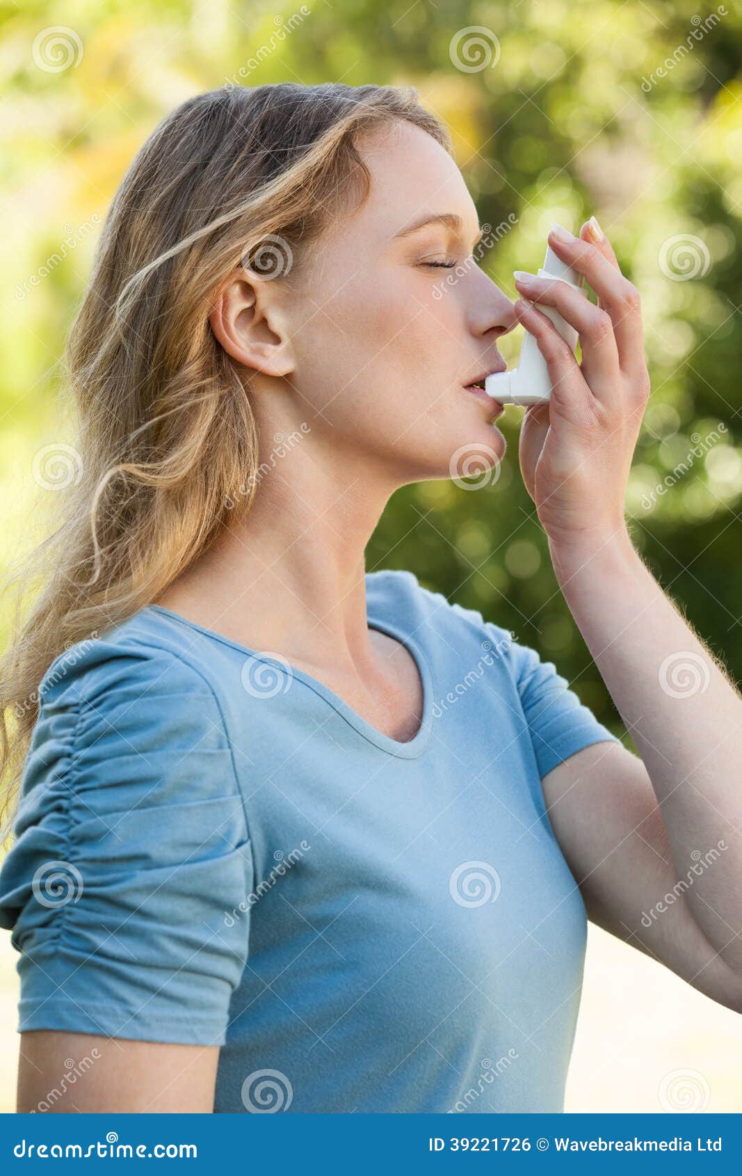 Young Woman Using Asthma Inhaler at Park Stock Photo - Image of illness ...