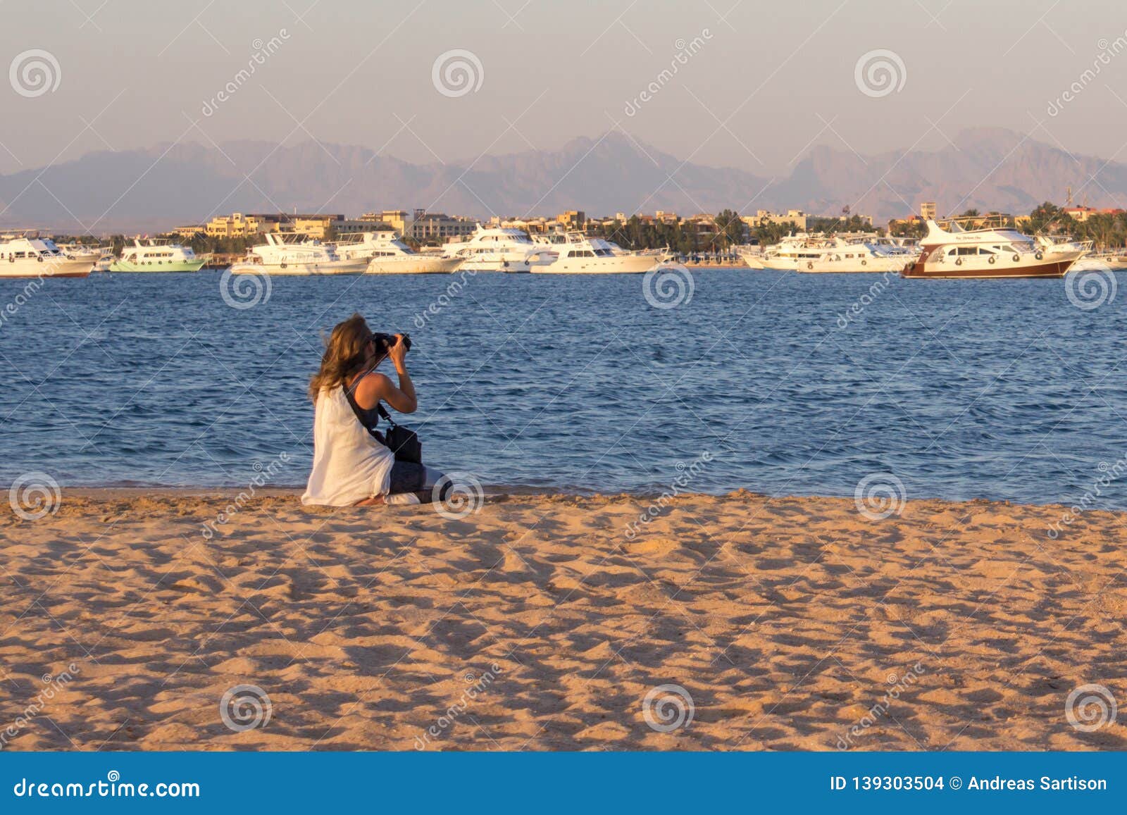 Young Woman Using Camera at the Beach Editorial Stock Image - Image of ...