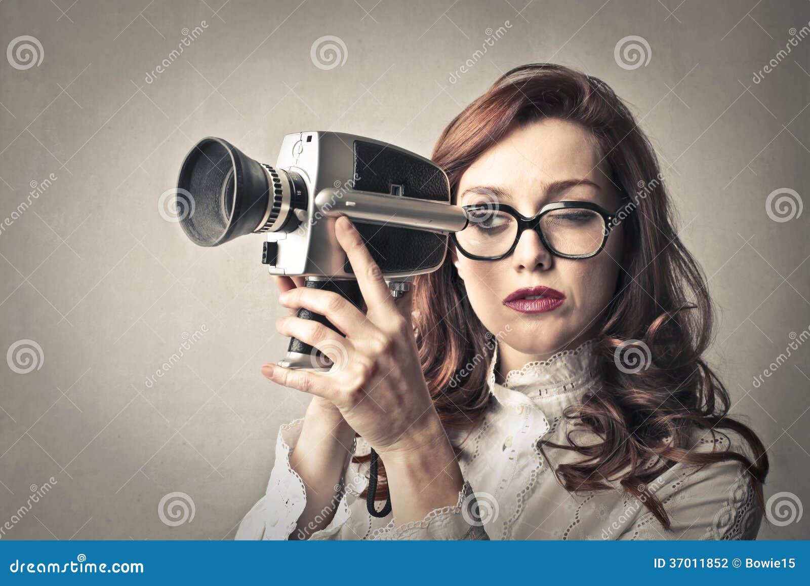 Young woman using a camera stock photo. Image of style - 37011852