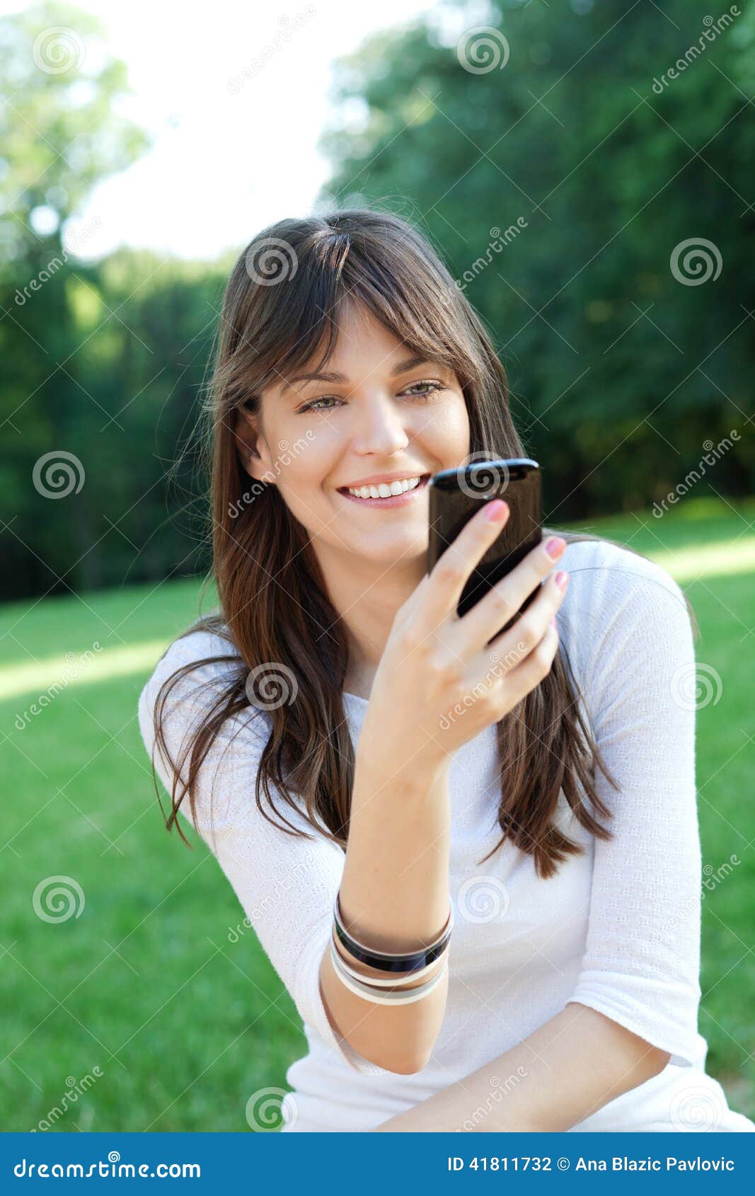 Young Woman Using Cell Phone Stock Photo - Image of message, cheerful ...