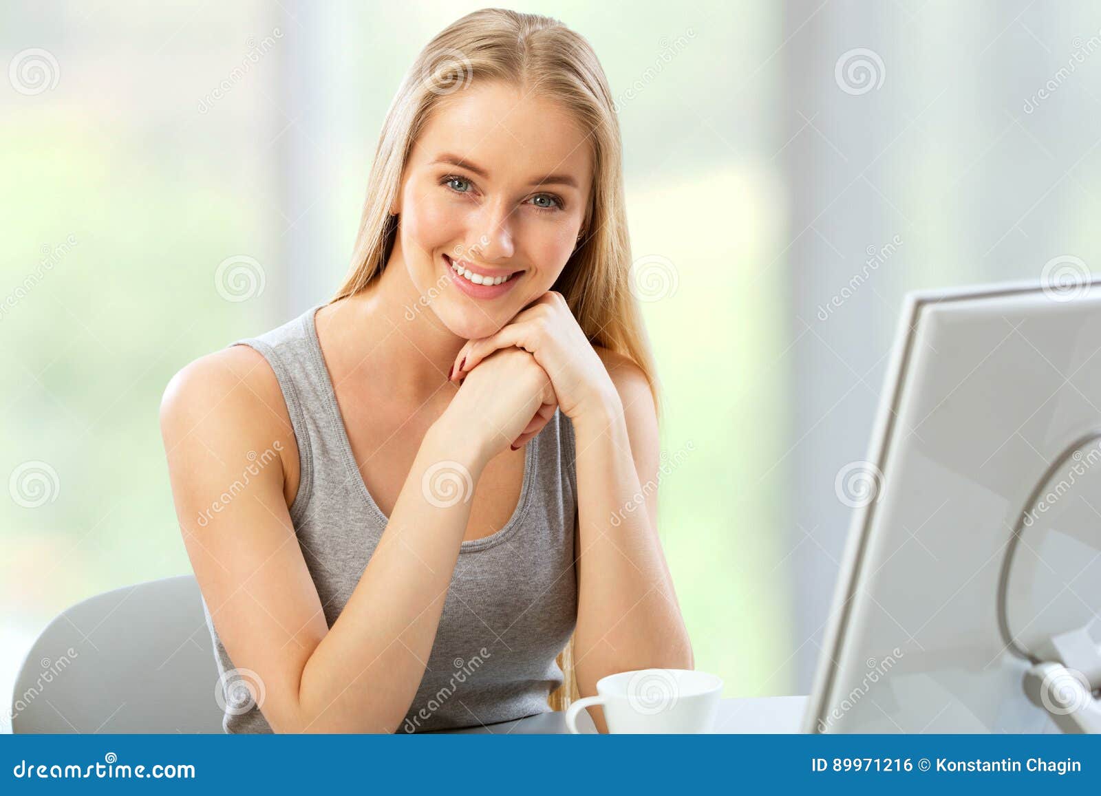 Young Woman Using Computer at Home Stock Photo - Image of long ...