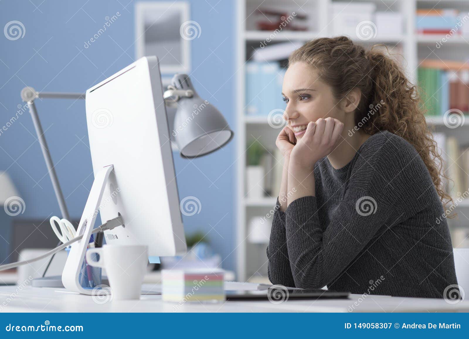 Young Woman Using a Computer in the Office Stock Image - Image of ...