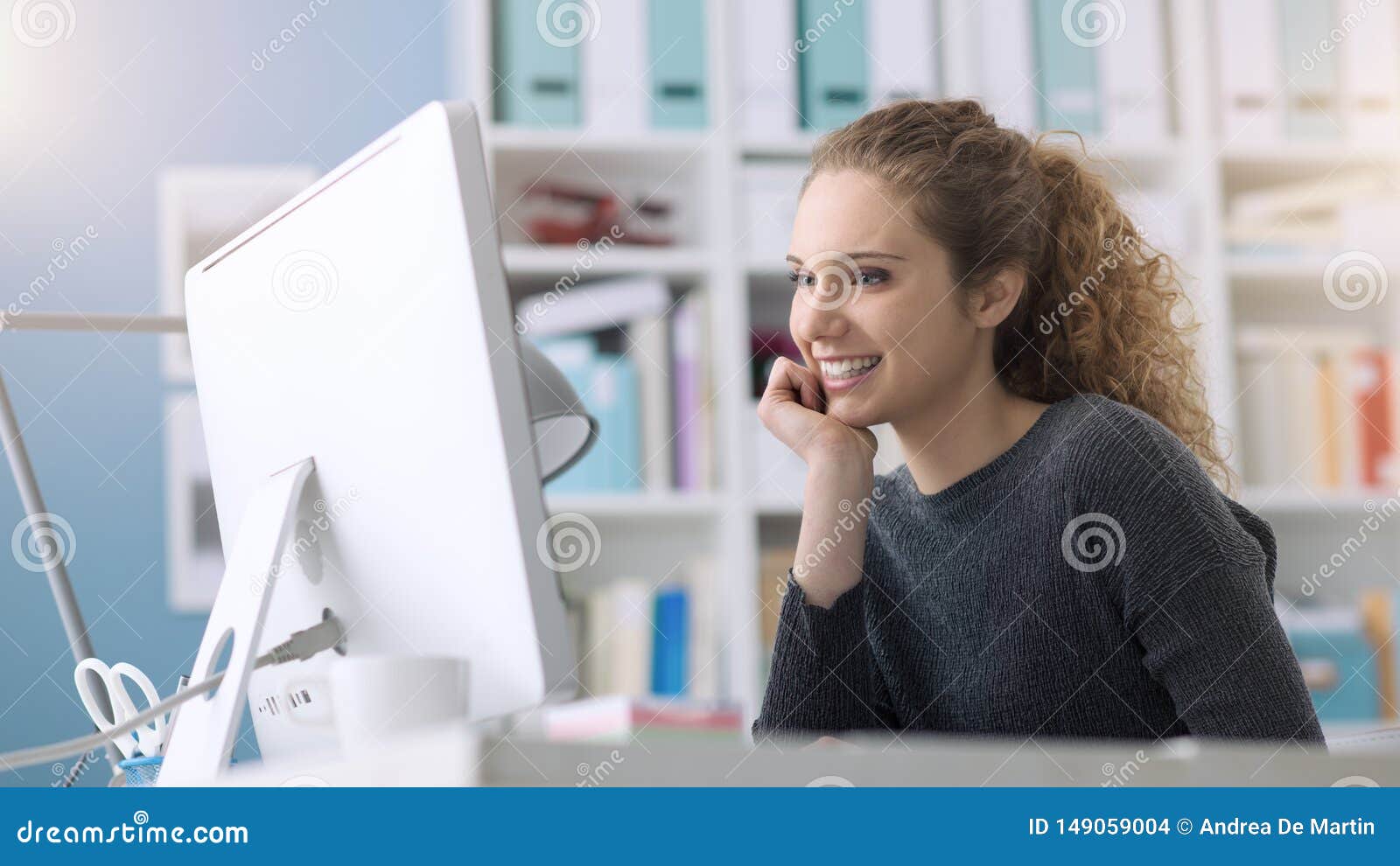 Young Woman Using a Computer in the Office Stock Photo - Image of happy ...