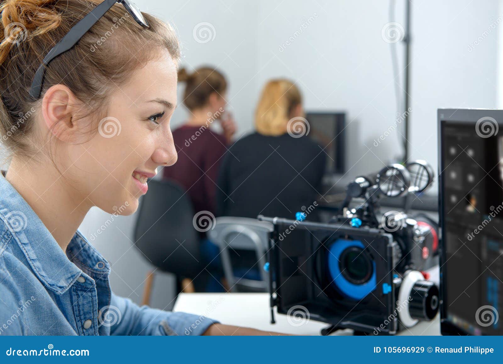 Young Woman Using Computer for Video Editing Stock Image - Image of ...