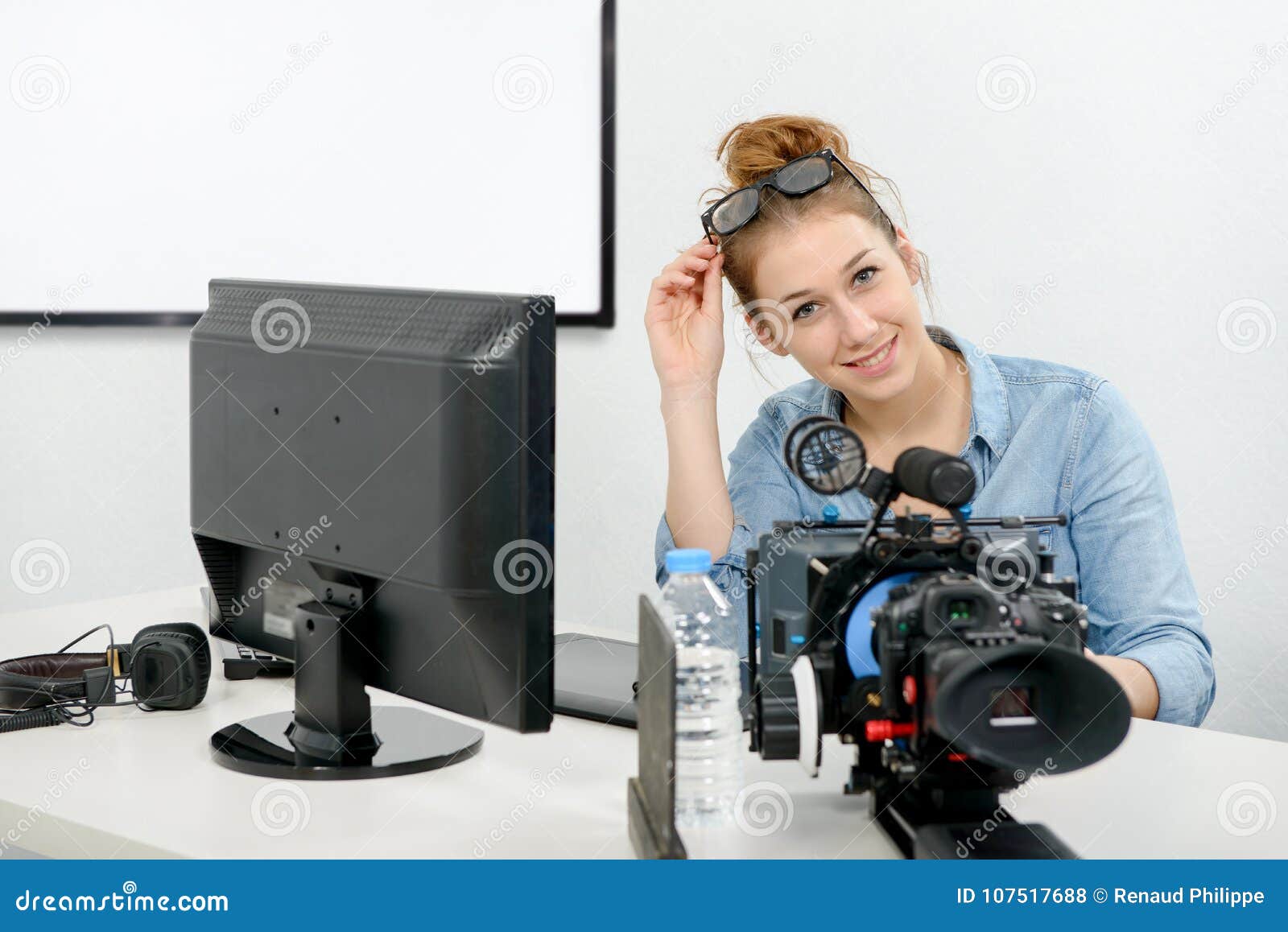 Young Woman Using Computer for Video Editing Stock Photo - Image of ...